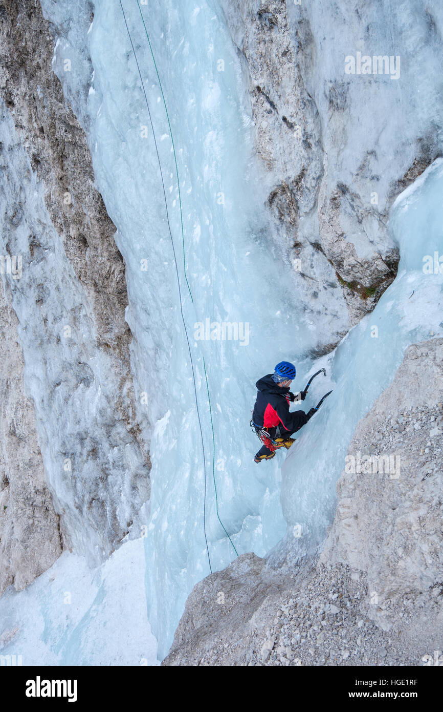 Ice climber soloing in a steep ice fall Stock Photo - Alamy