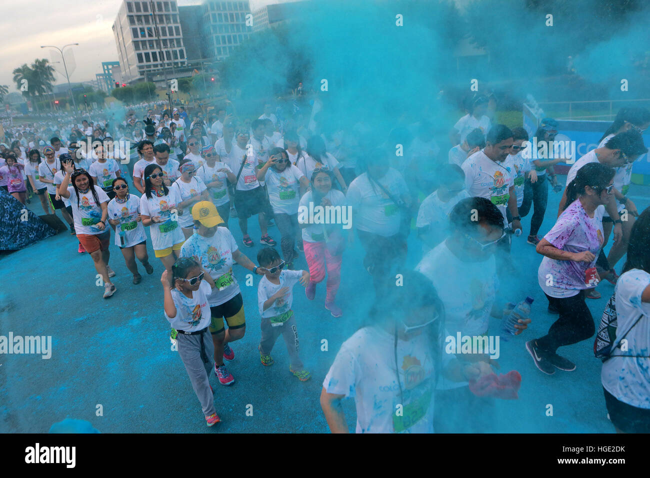 Pasay City, Philippines. 8th Jan, 2017. Colored powders are thrown on ...