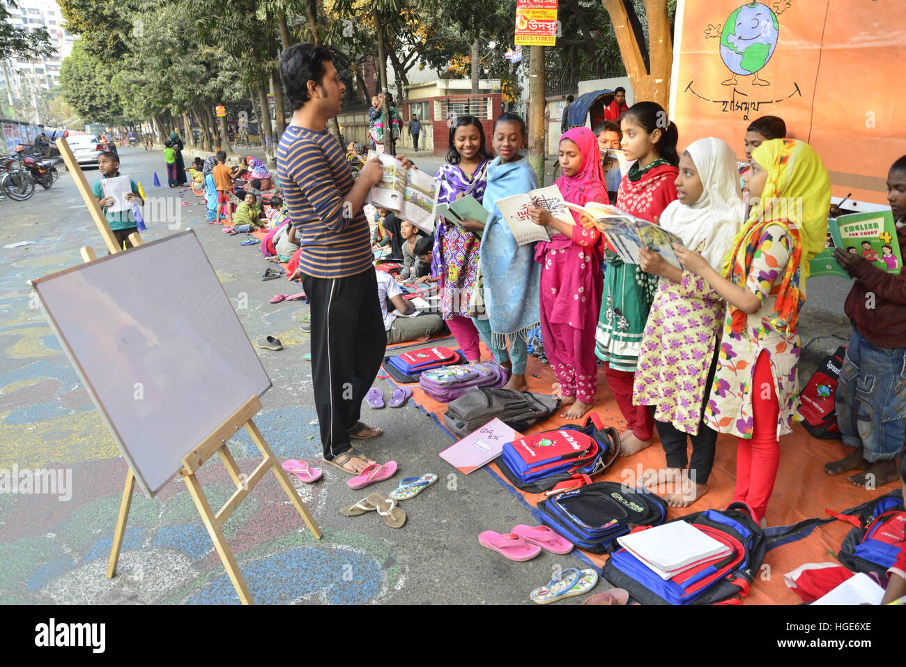 Dhaka, Bangladesh. 08th Jan, 2017. A group of street children studies ...