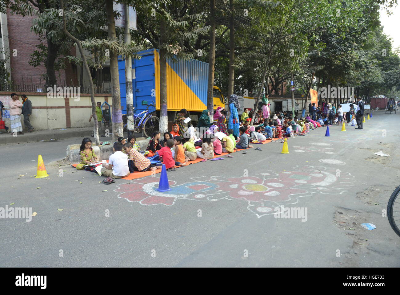 Dhaka, Bangladesh. 08th Jan, 2017. A group of street children studies ...