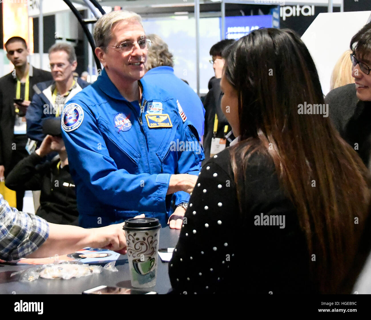 Space Shuttle astronaut Don Thomas meets with fans at the NASA booth ...