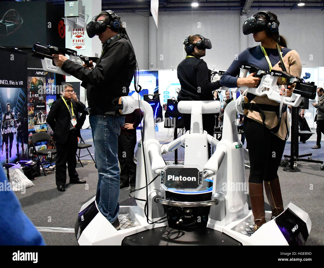 CES attendees try out Nined VR game setup during day 2 at the 2017 CES ...