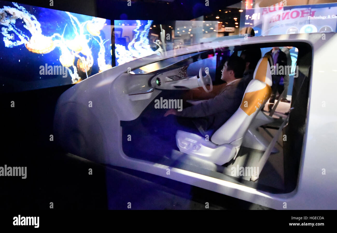 Las Vegas NV, USA. 8th Jan, 2017. CES attendees try out Toyota's ...
