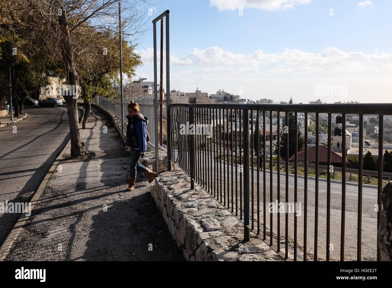 Woman walks through neighborhood hi-res stock photography and images ...
