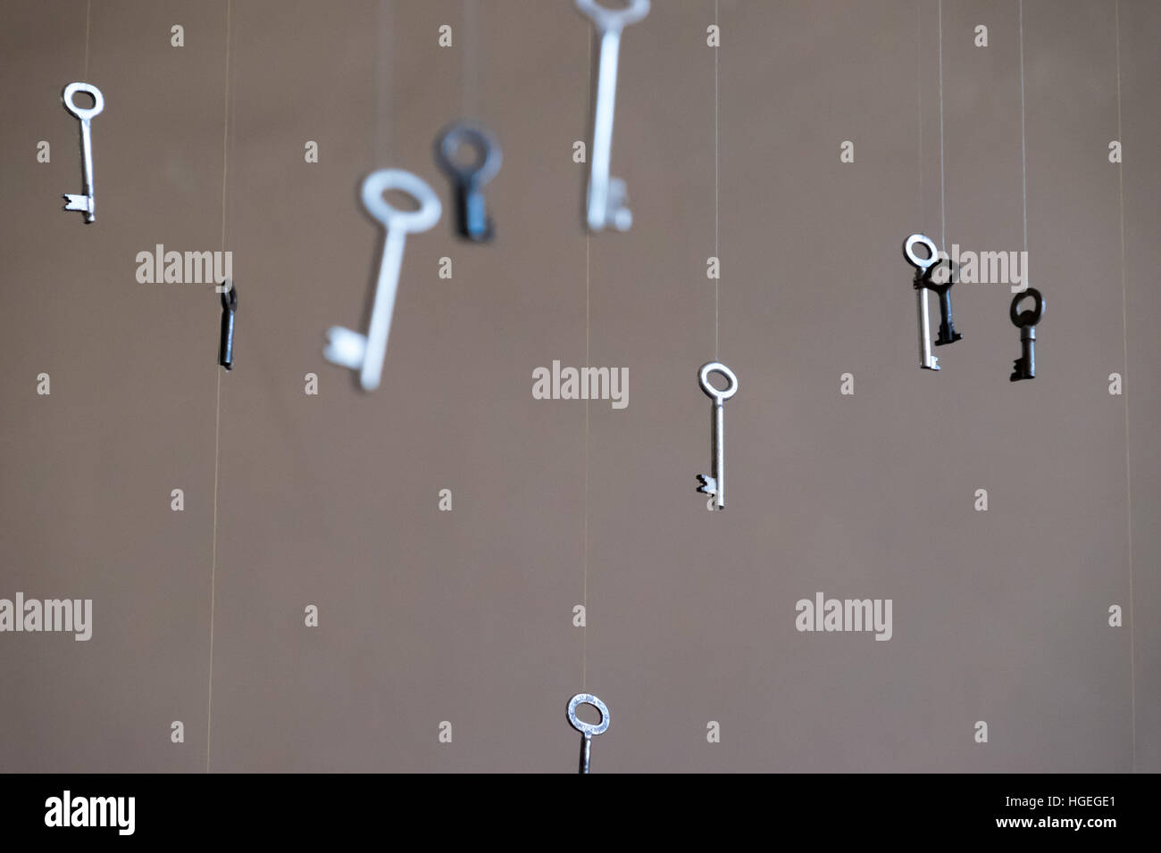 Vintage key hanging on string. The key of success Stock Photo - Alamy