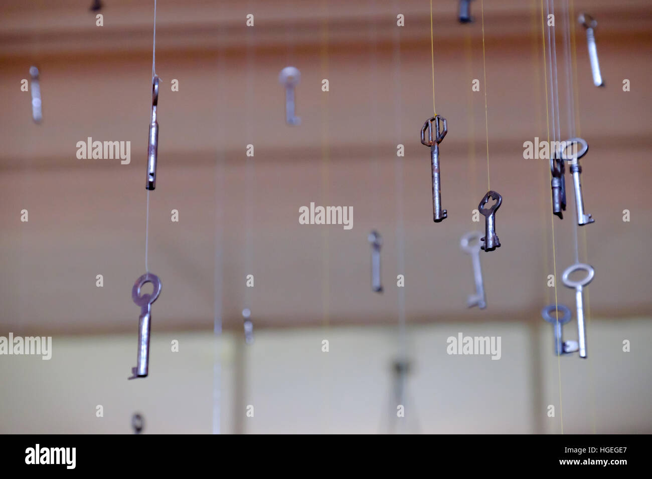 Vintage key hanging on string. The key of success Stock Photo - Alamy