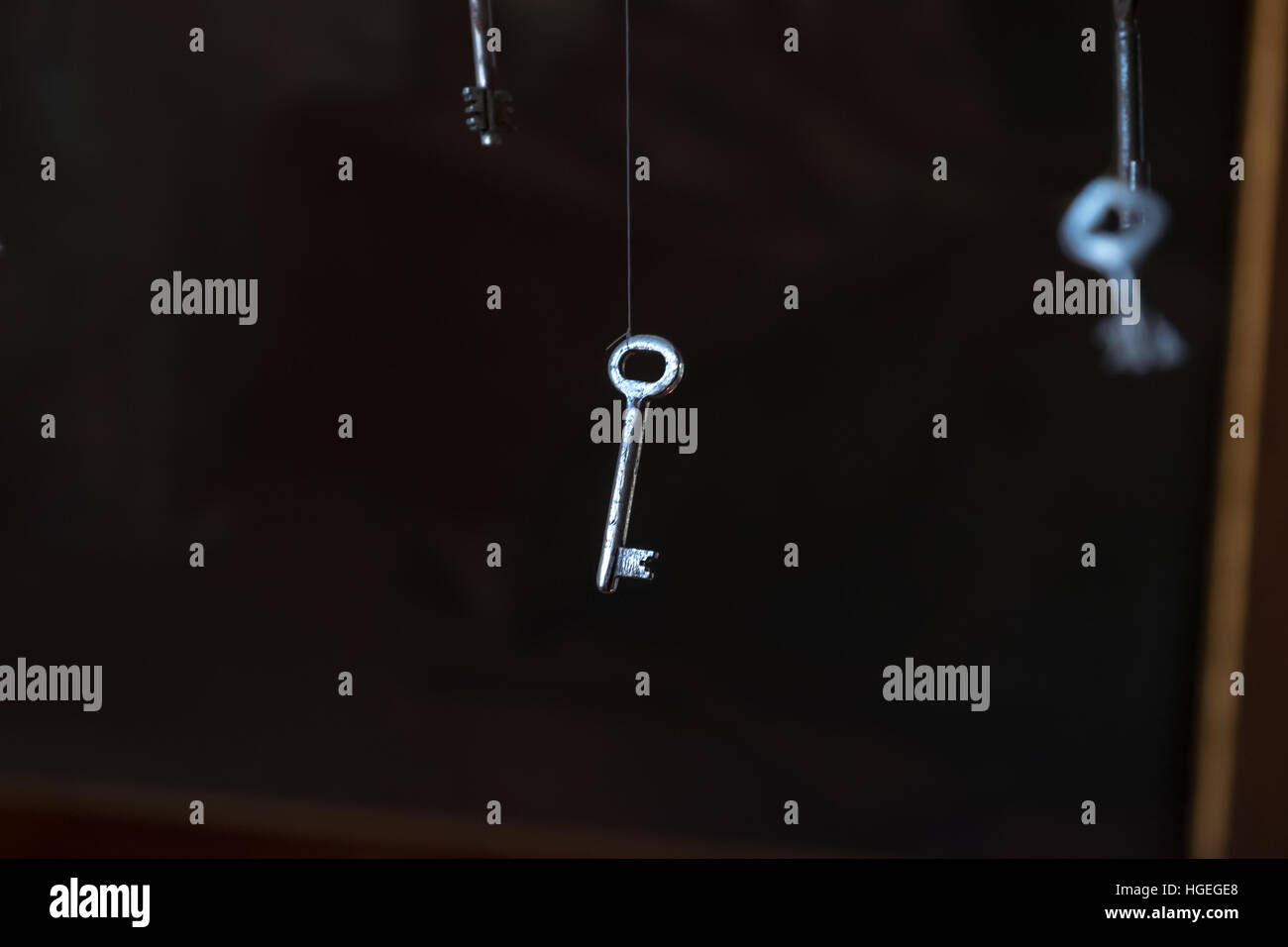 Vintage key hanging on string hi-res stock photography and images - Alamy