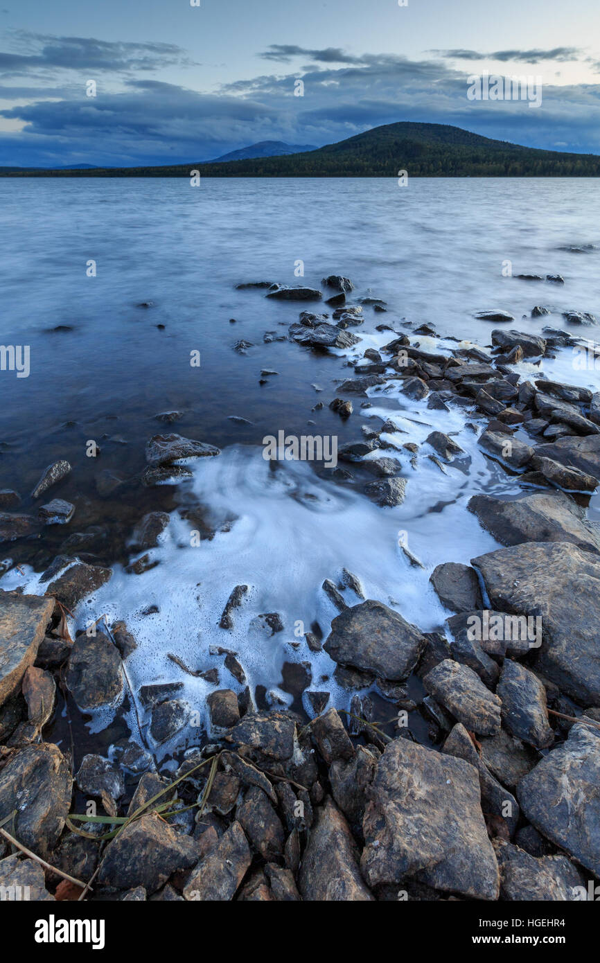 rocky coast stone waterfront sunset Stock Photo - Alamy