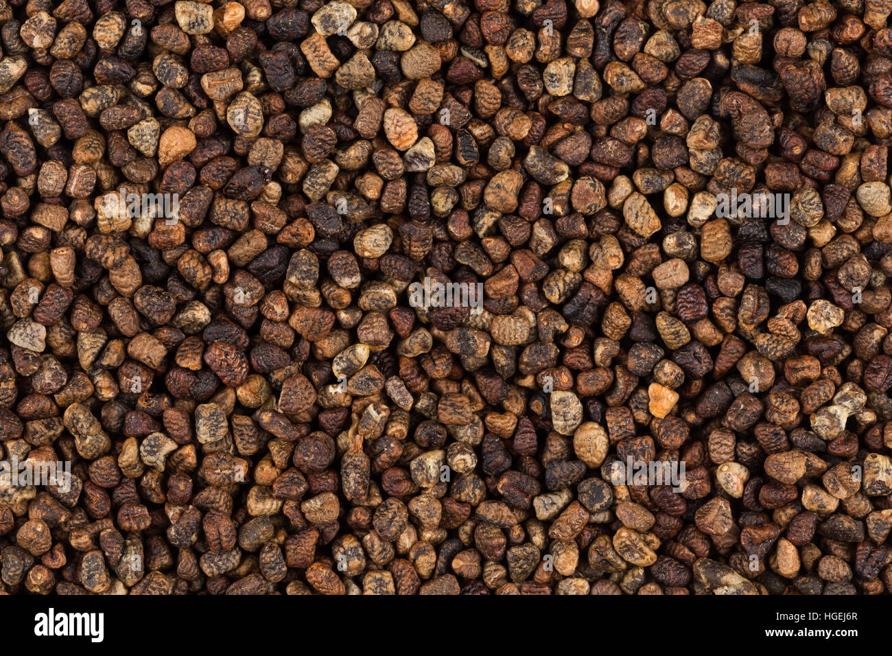 Decorticated cardamom seeds close up image can be used for background ...