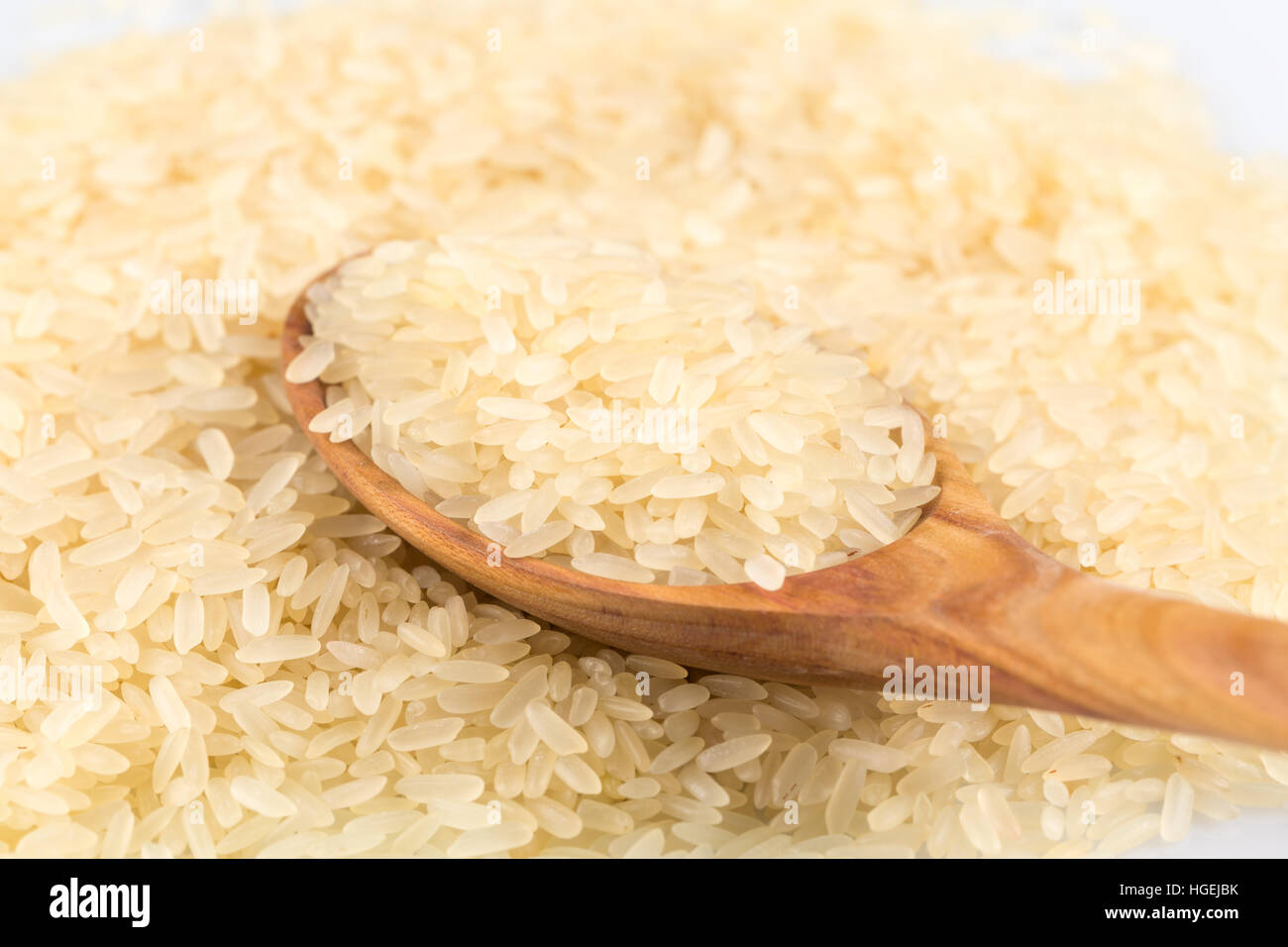 spoon of rice on puffed rice cereal background close up Stock Photo - Alamy