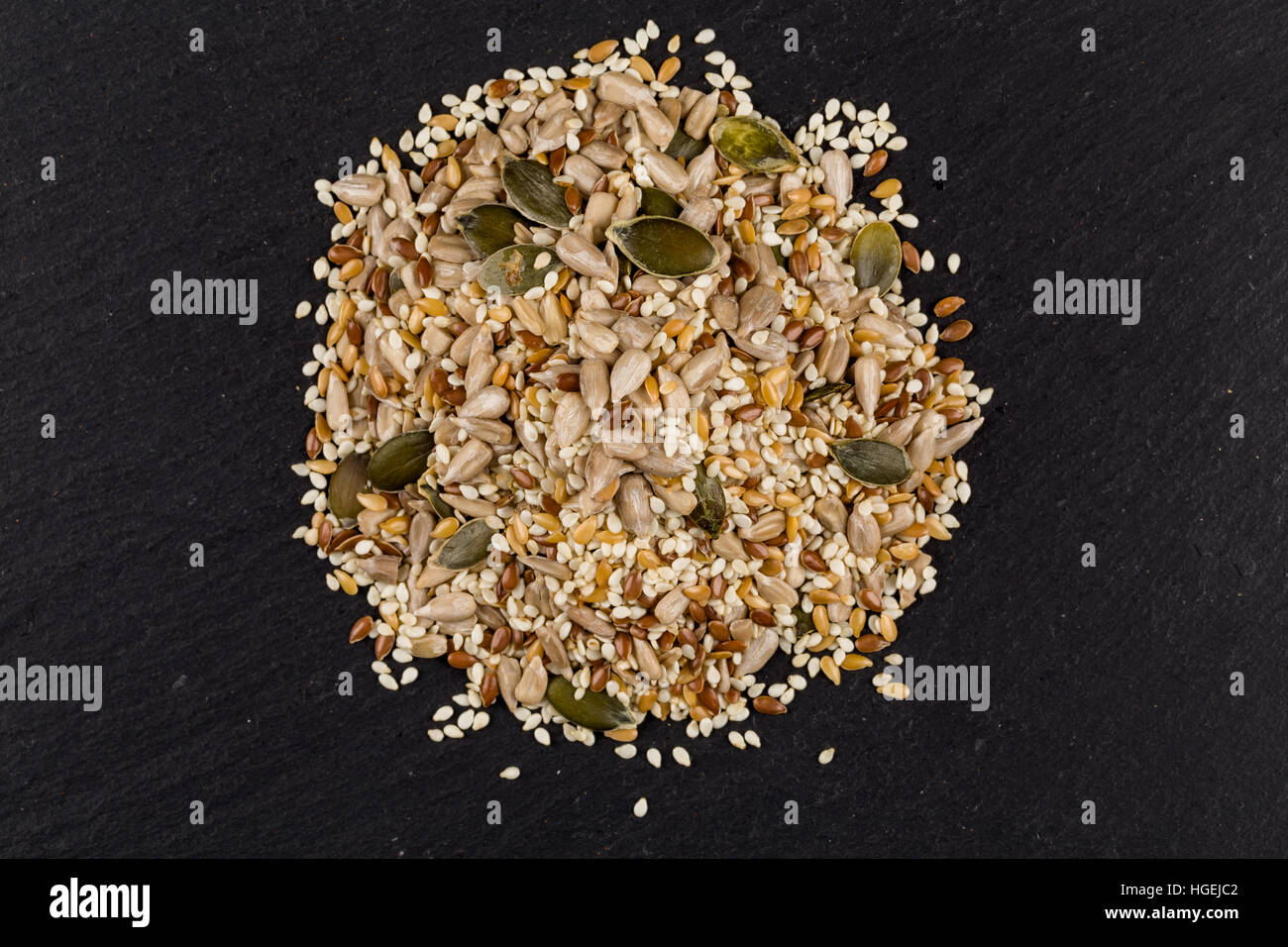 Healthy seeds mix on ф stone background Stock Photo - Alamy