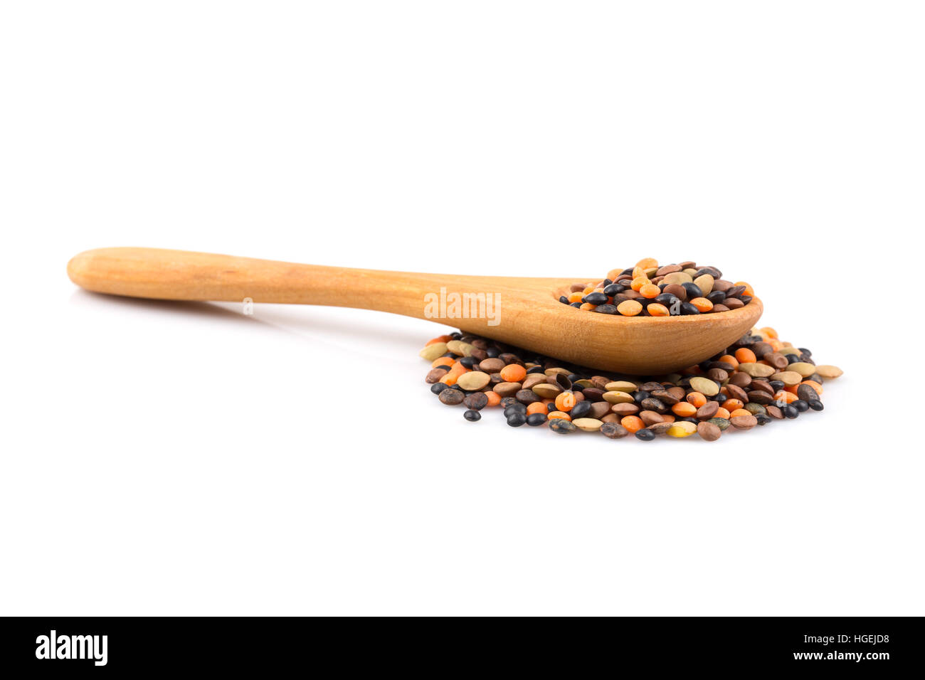 Various lentils mix on a white background in a wooden spoon Stock Photo ...