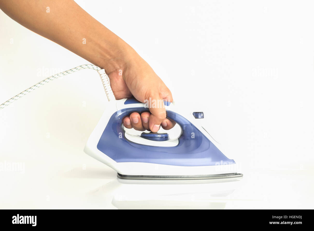 Young woman ironing white mans hi-res stock photography and images - Alamy