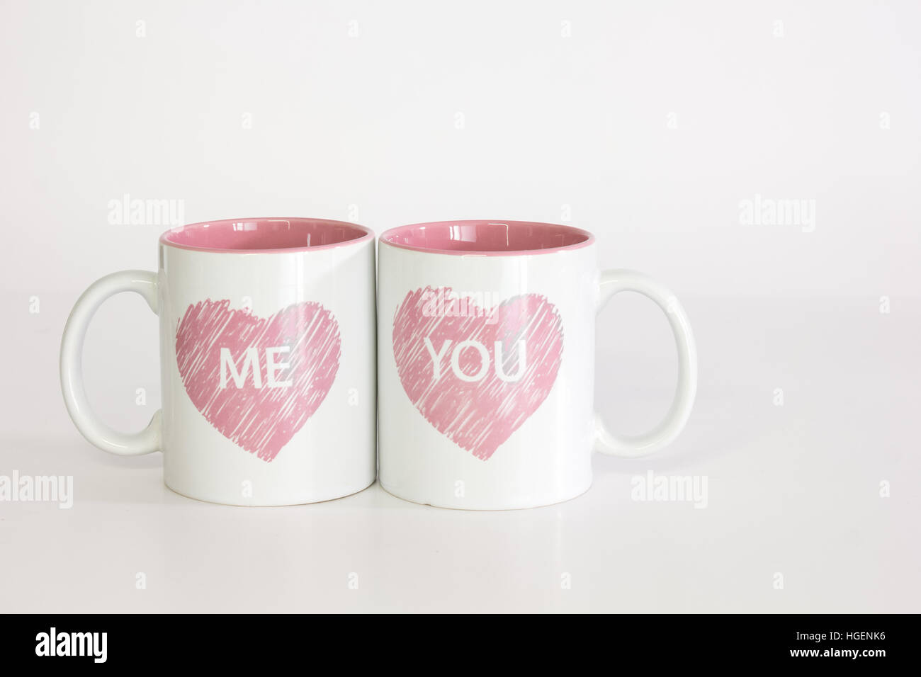 two White ceramic mugs Isolated on a white background Stock Photo - Alamy
