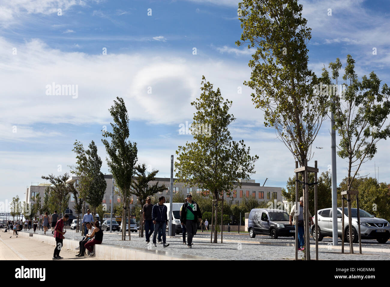 People enjoying the Tagus River beach and niverside promenade called ...