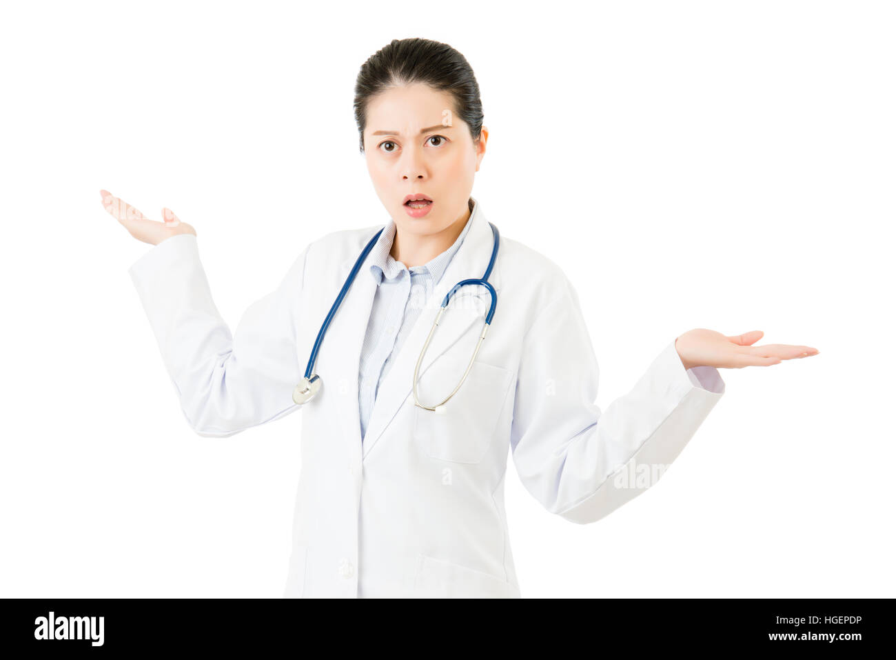 Young woman doctor has issue problem at work. isolated on white ...