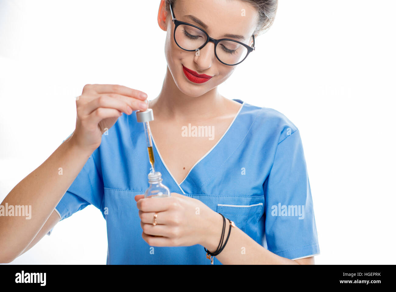 Doctor with medical dropper Stock Photo - Alamy