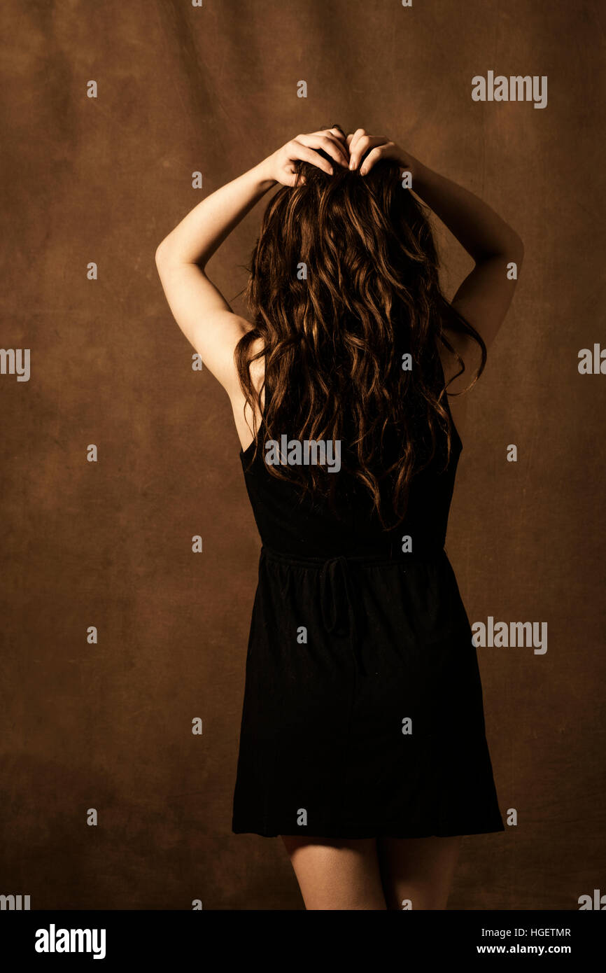 See his hands on the back of the head hi-res stock photography and ...