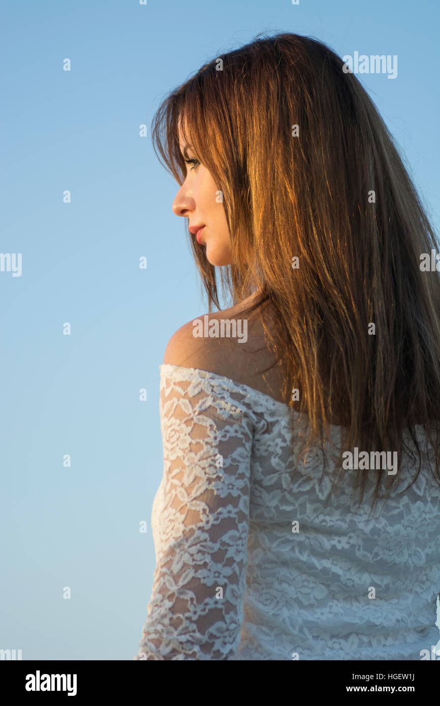 Woman watching back view hi-res stock photography and images - Alamy