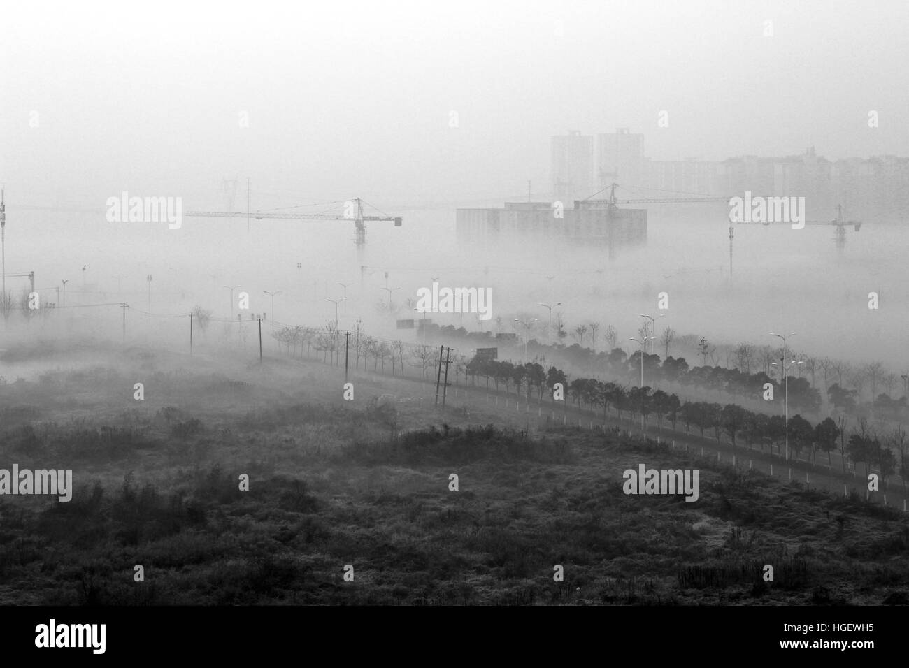 Morning fog in china Stock Photo - Alamy