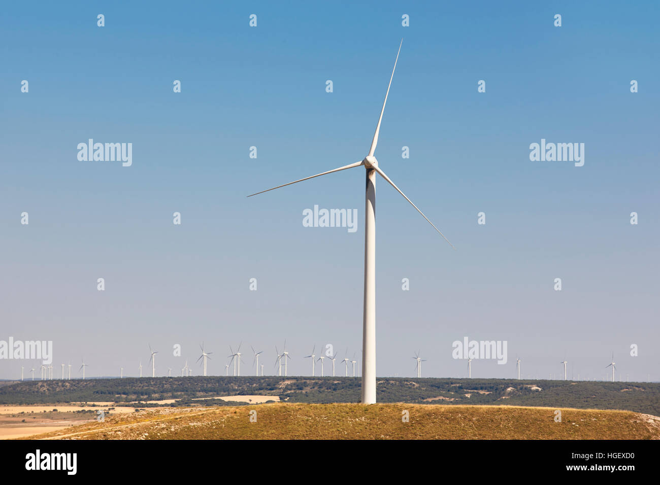 Wind turbines and blue sky. Clean alternative renewable energy ...