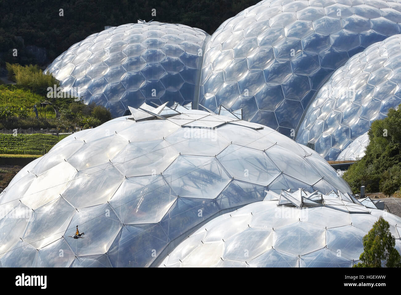 Elevated view across biomes' roofline with zip slide. Eden Project ...
