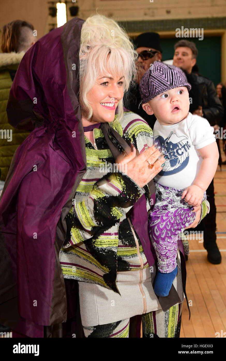 Jaime Winstone and her son Raymond on the front row during the Vivienne ...