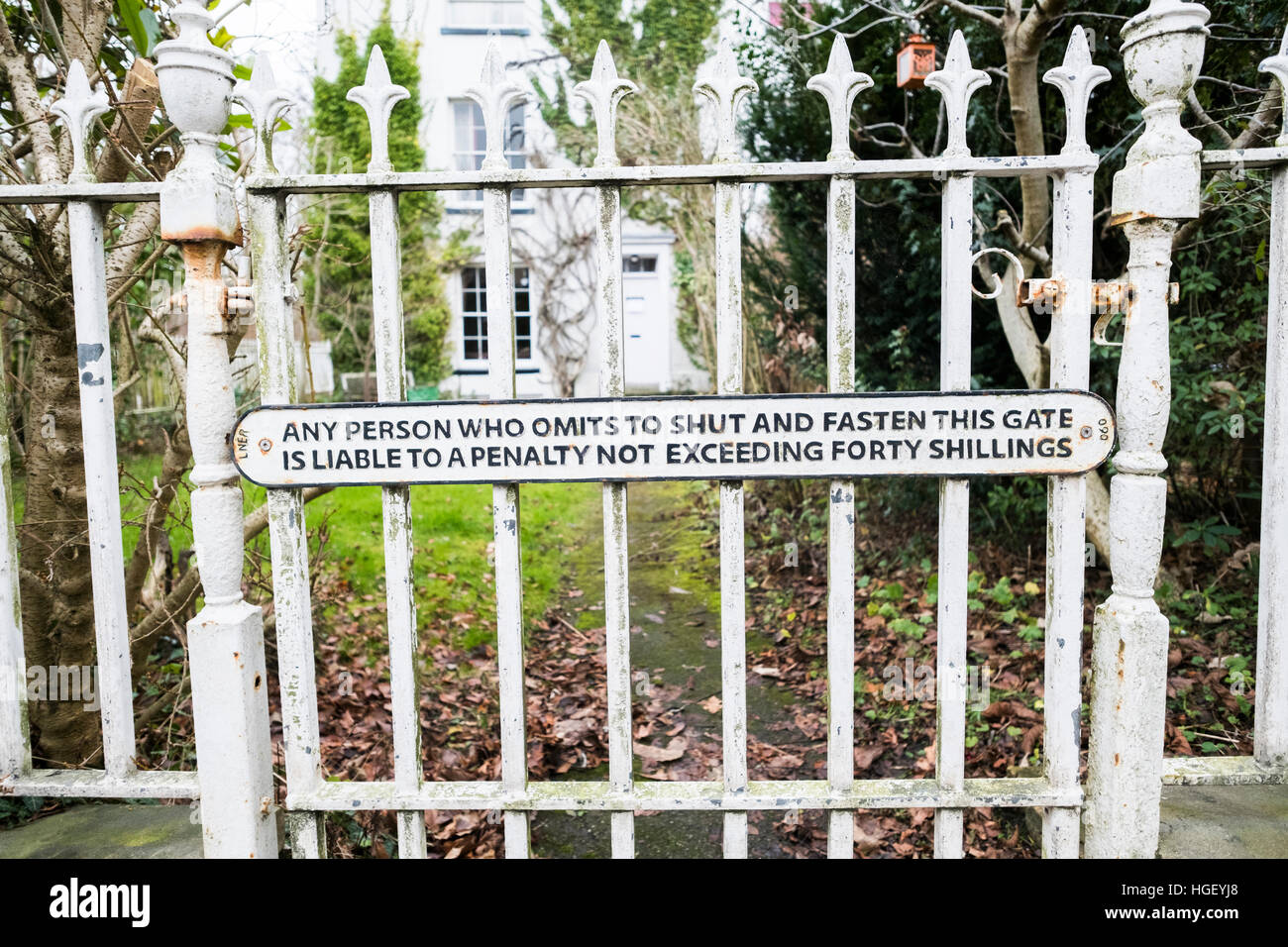 A fomer LNER railway warning sign "Any Person who Omits to Shut and ...
