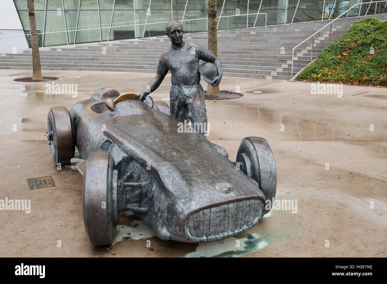 Statue of racing driver Juan Manuel Fangio outside of the Mercedes-Benz ...