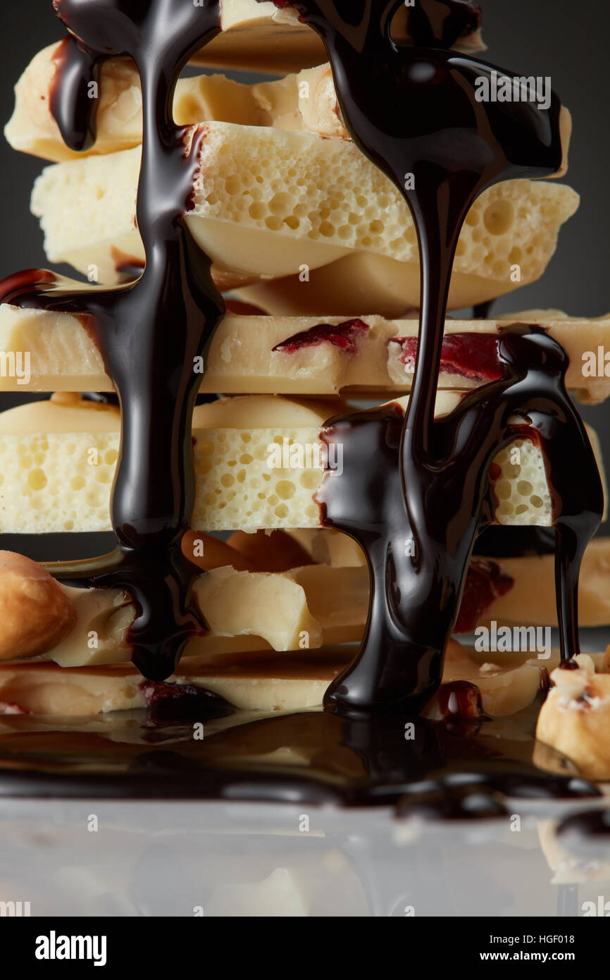 syrop pouring onto a piece of chocolate Stock Photo - Alamy