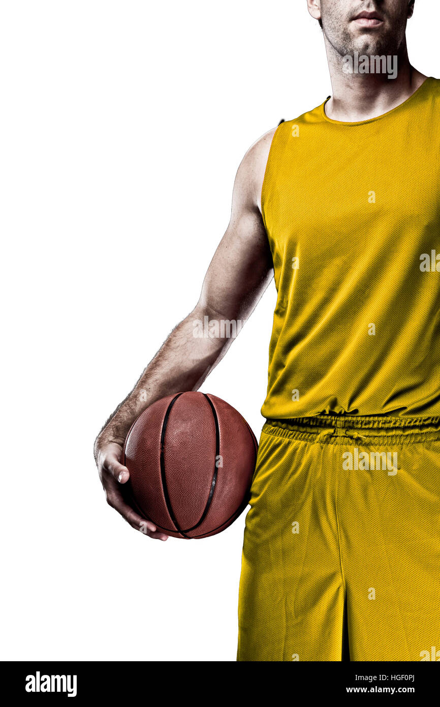 Basketball player on a yellow uniform, on a white background Stock ...