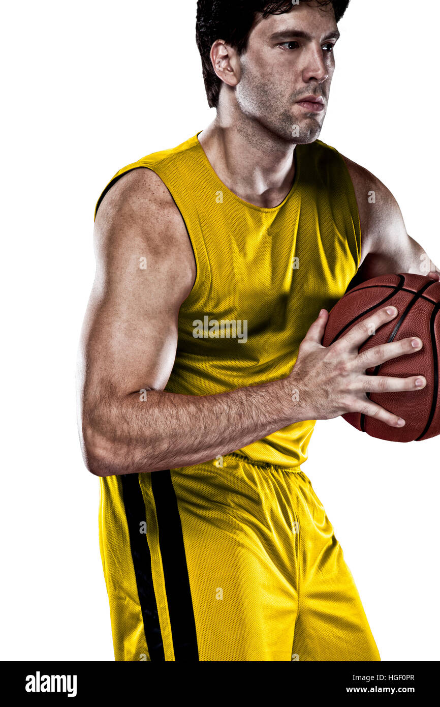 Basketball player on a yellow uniform, on a white background Stock ...