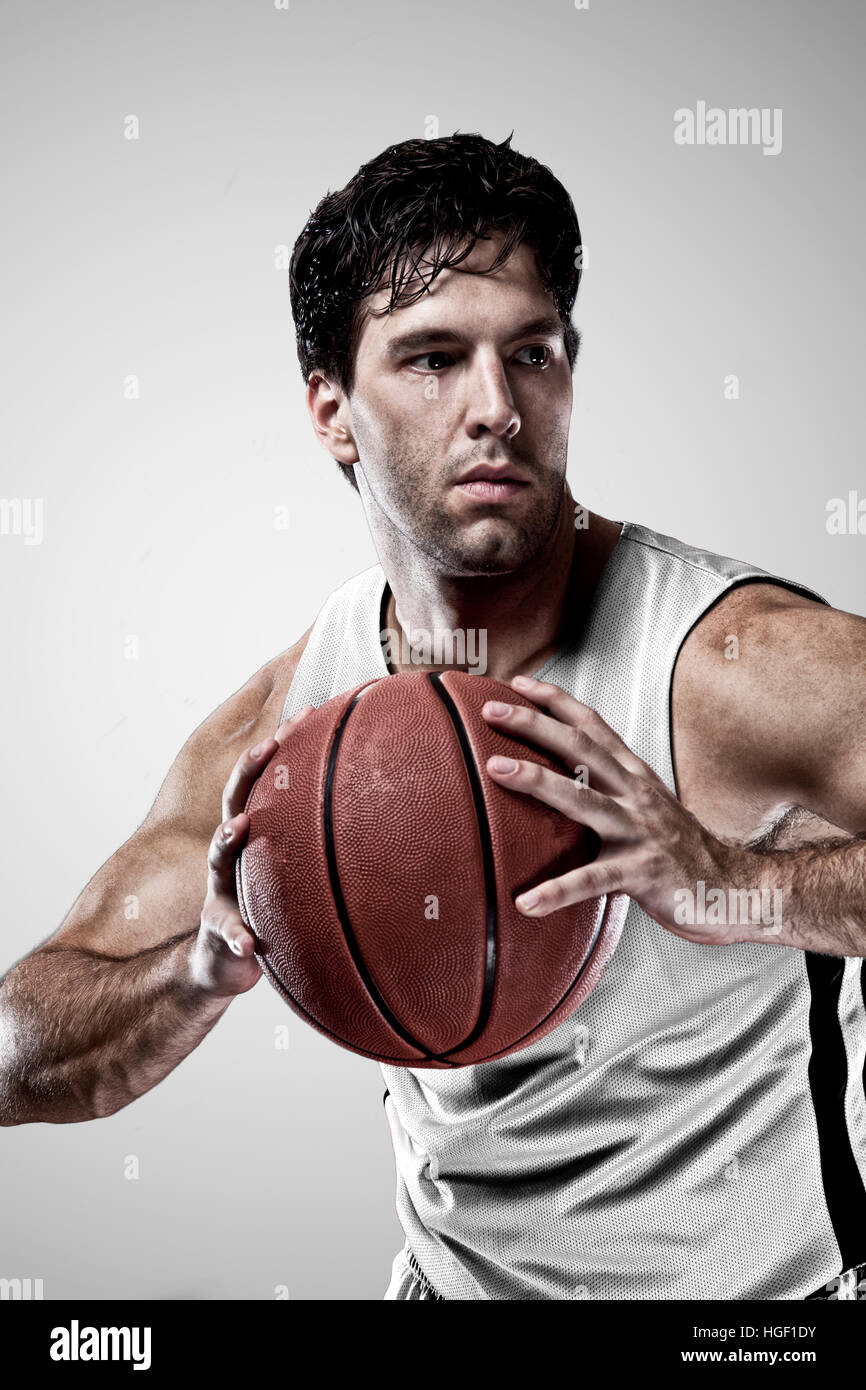 Basketball player on a white uniform, on a white background Stock Photo ...