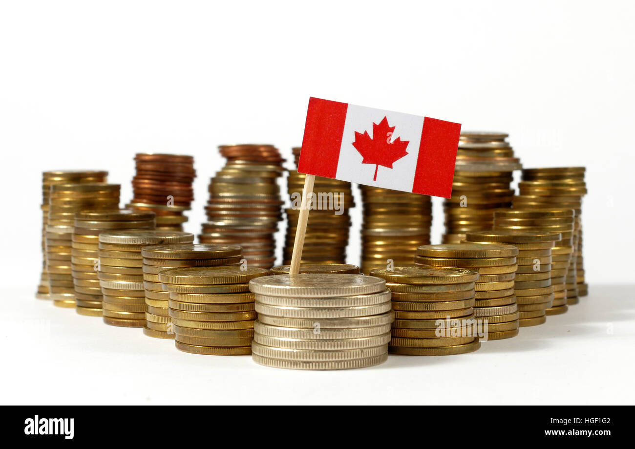 Canada flag waving with stack of money coins Stock Photo - Alamy
