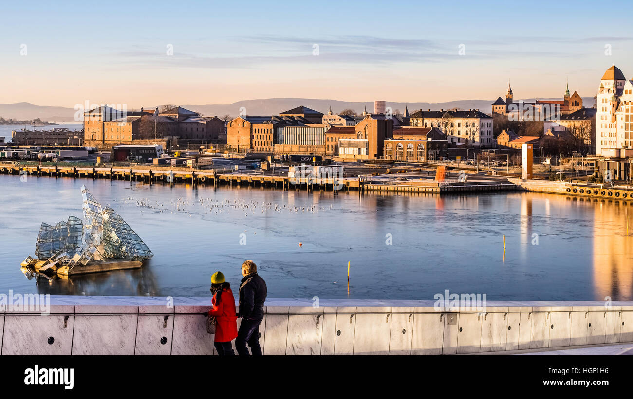 Watching the sunset with skyline view from the Opera House, Oslo Stock ...