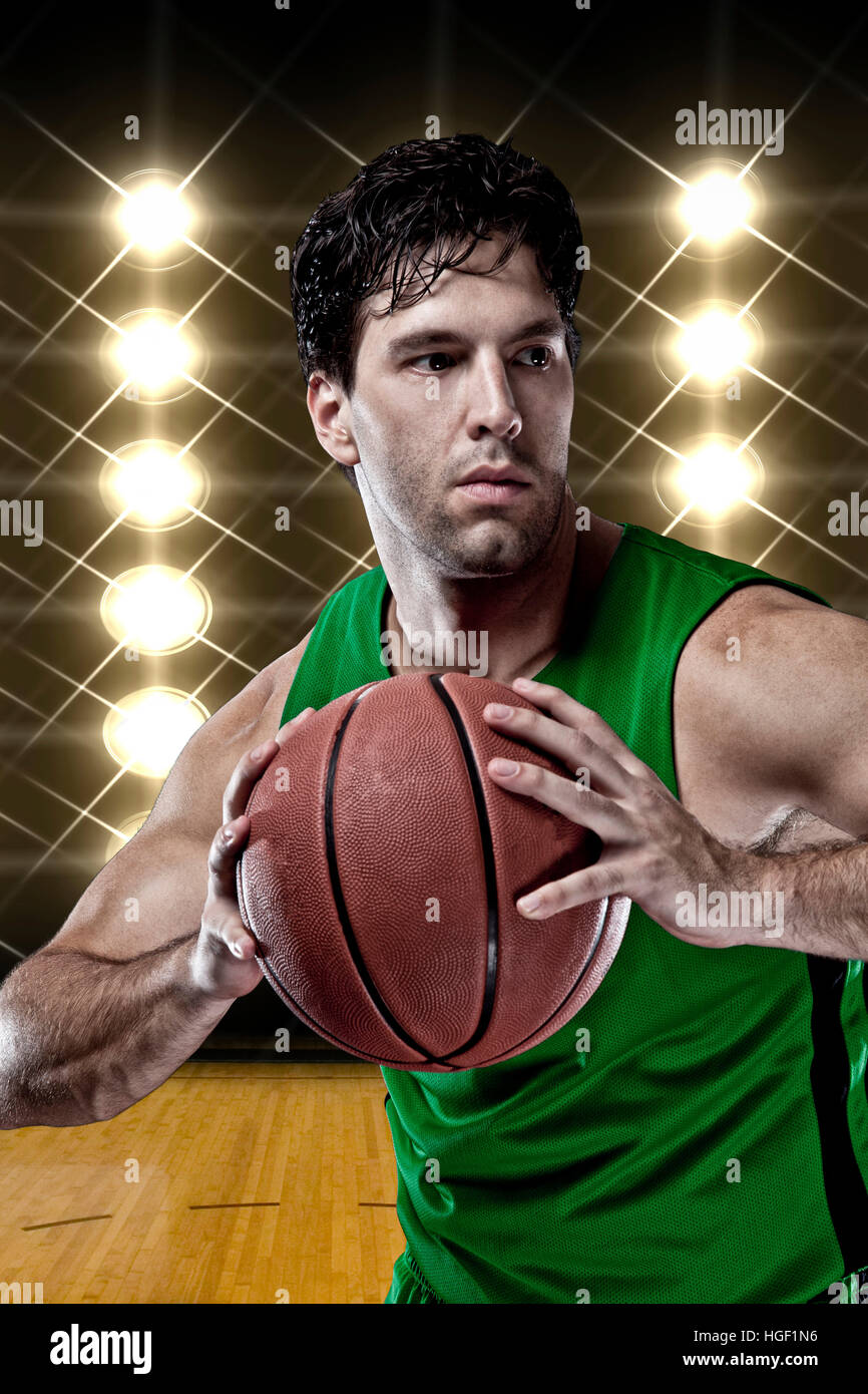 Basketball player on green uniform hi-res stock photography and images ...