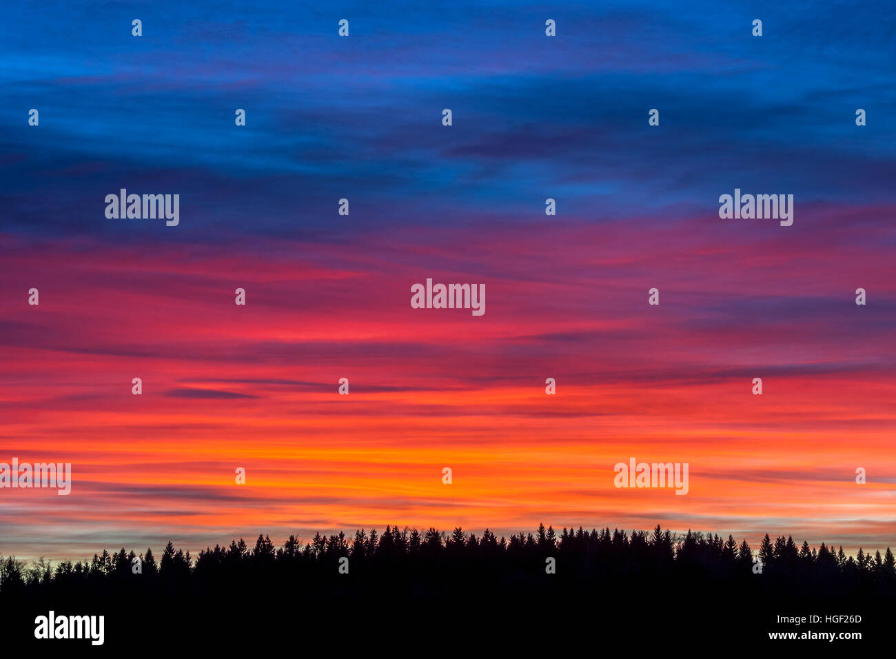 Sunset in mountains Stock Photo - Alamy
