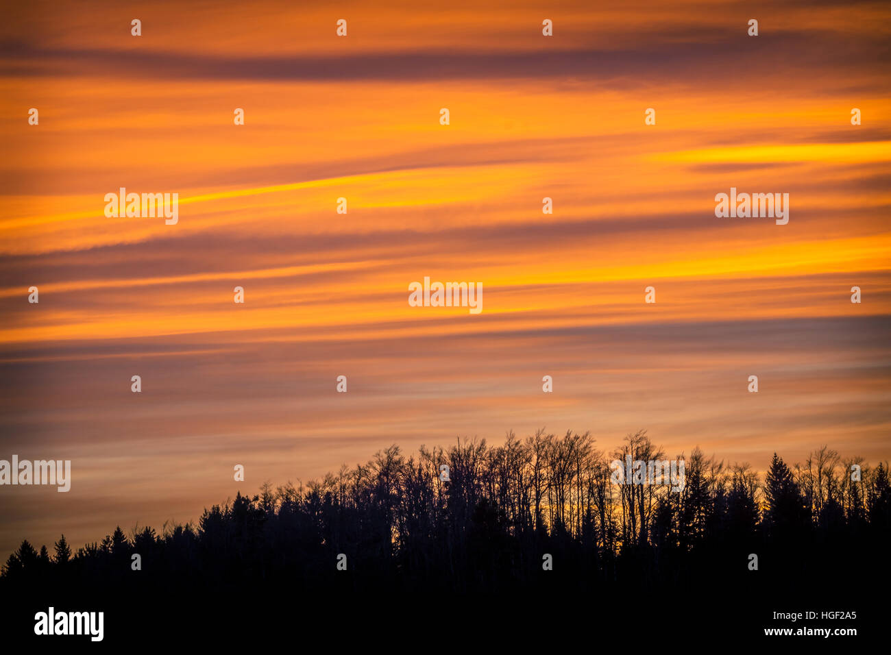 Sunset in mountains Stock Photo - Alamy