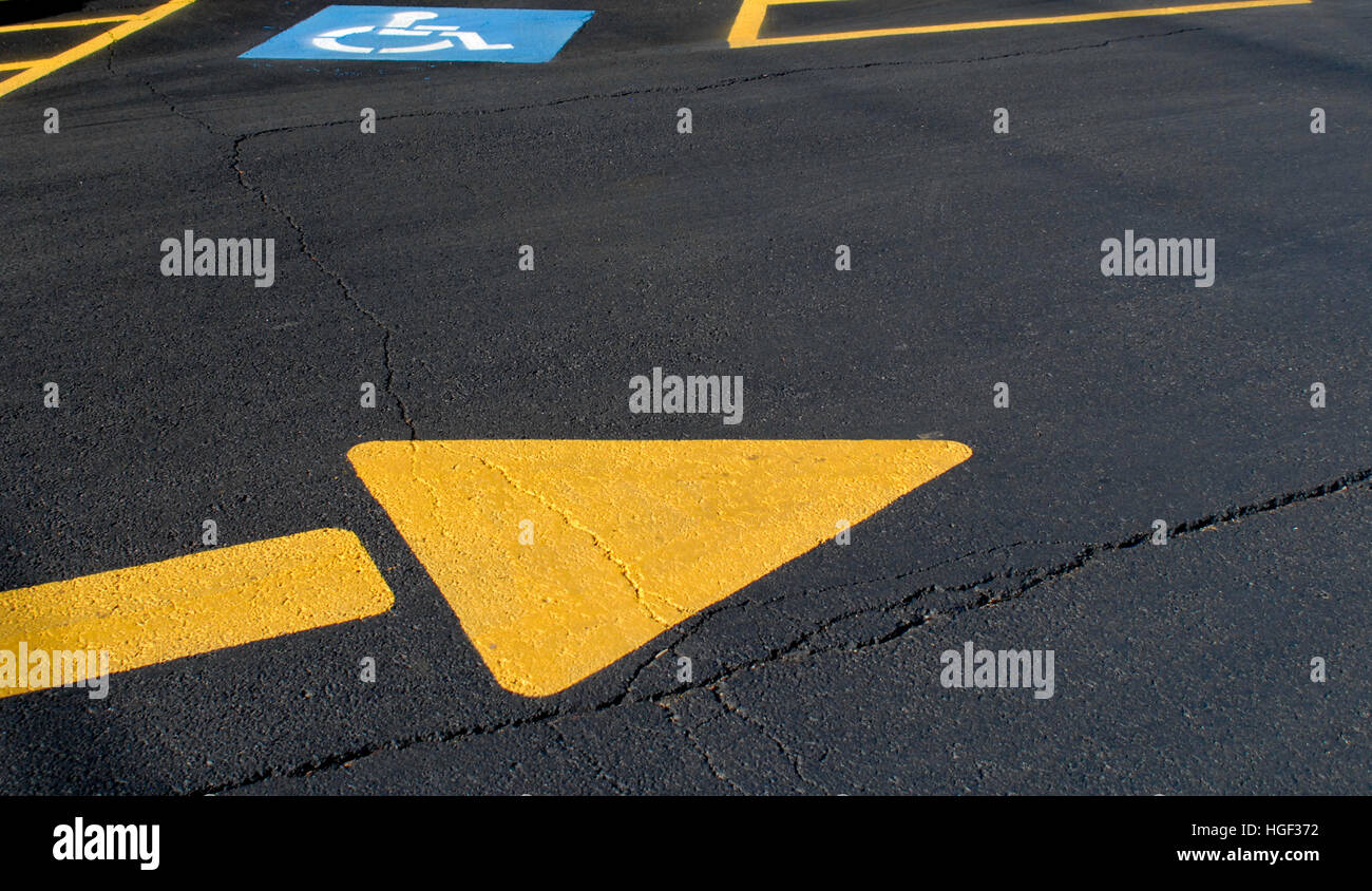 handicapped parking sign painted on pavement Stock Photo - Alamy