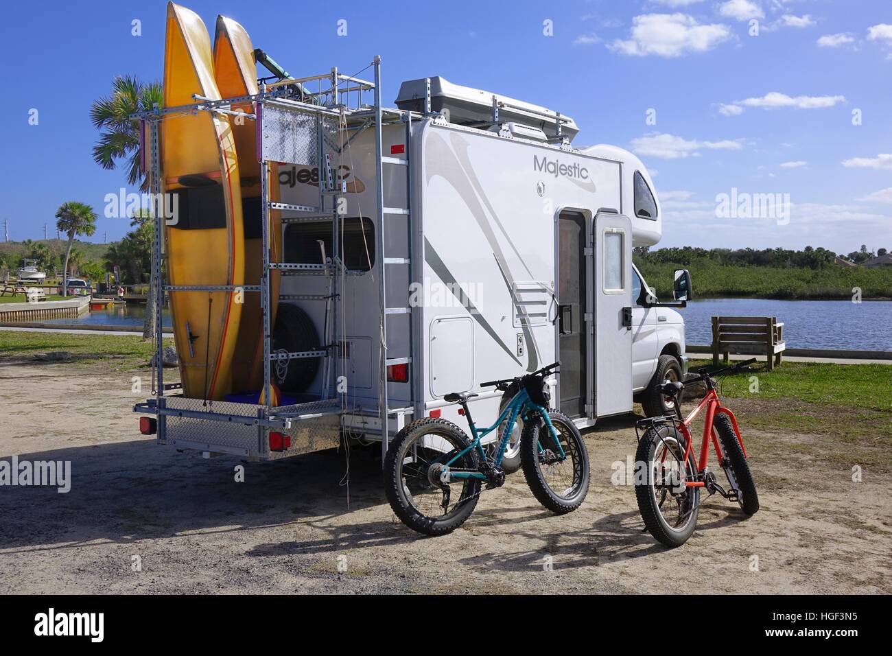 Motorhome camper with a custom-made canoe and bicycle holder Stock ...