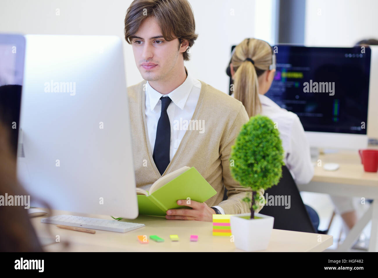 startup business, software developer working on computer at modern ...