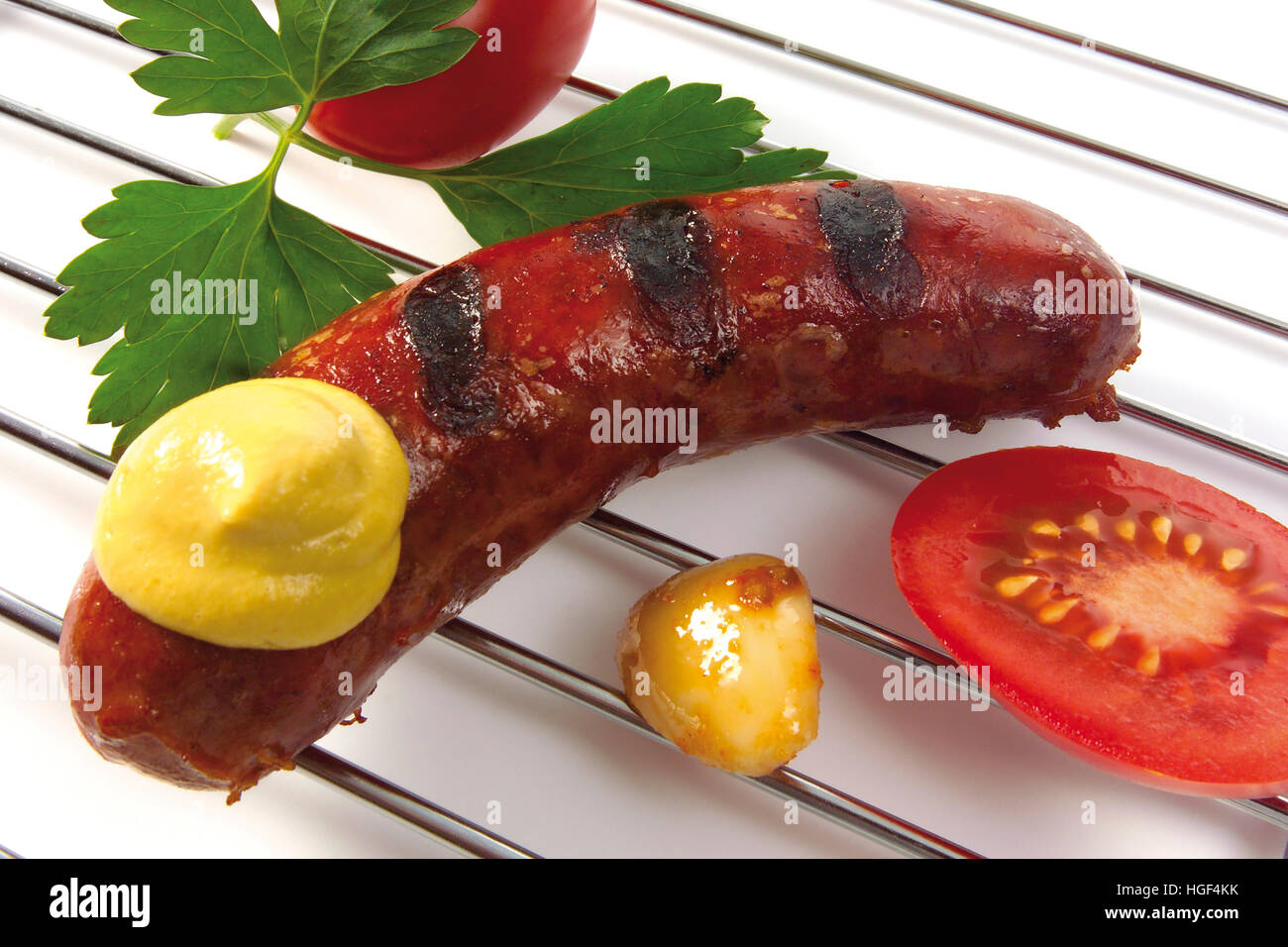 Spanish grilled sausage with grill marks on a grill Stock Photo - Alamy