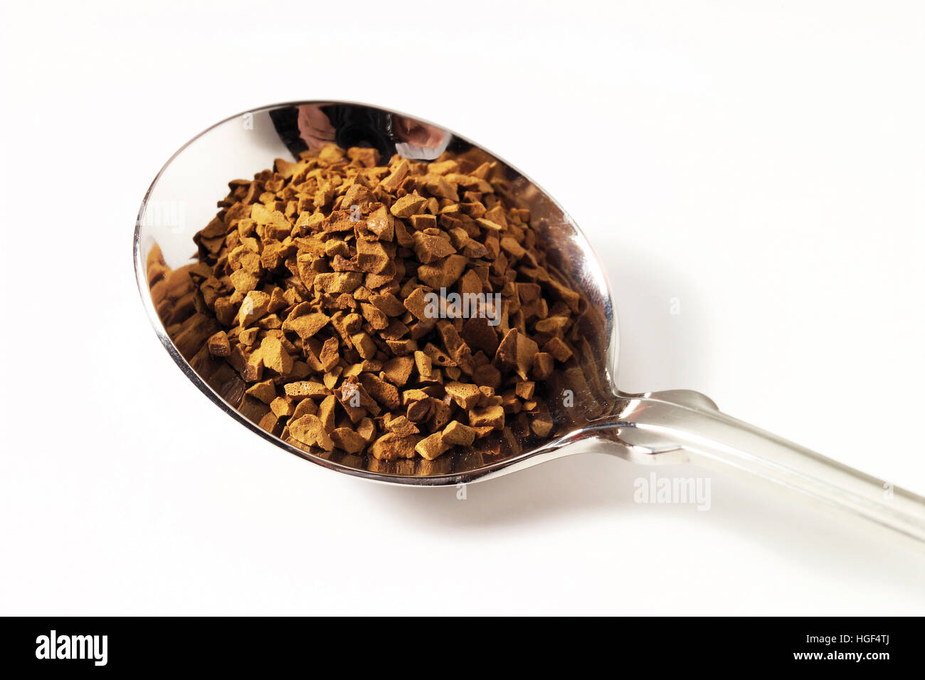 Granulated coffee, soluble coffee on spoon Stock Photo - Alamy