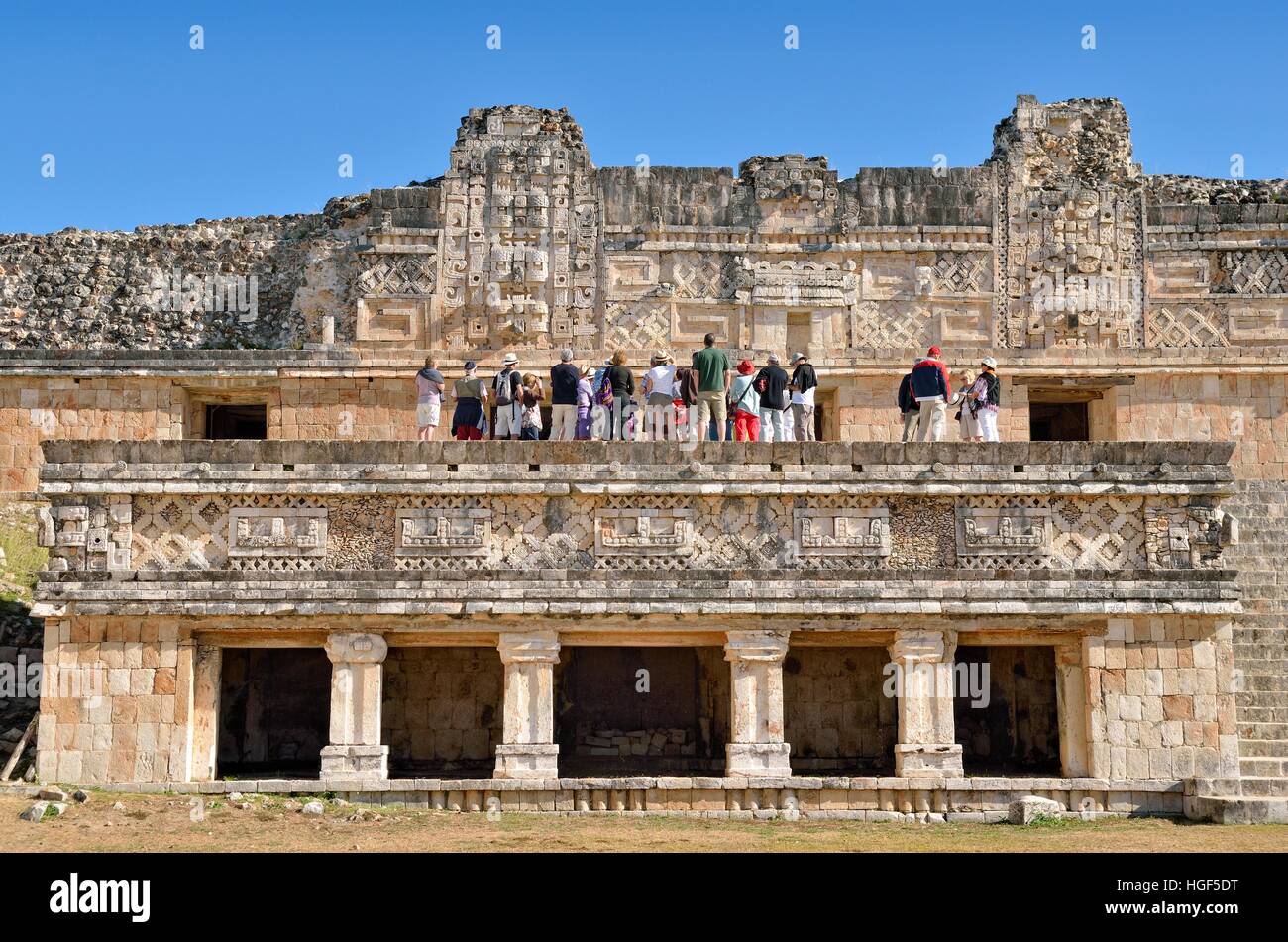 Tourists on Cuadrangulo de las Monjas, Nun's Quadrangle, ancient Mayan ...