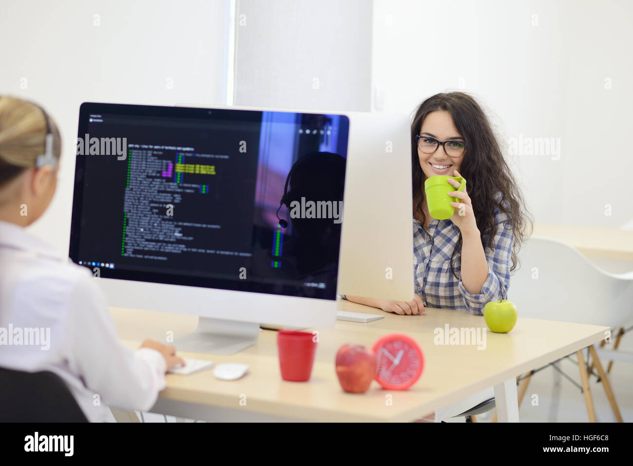 Young businesswoman on a coffee break. Using computer Stock Photo - Alamy