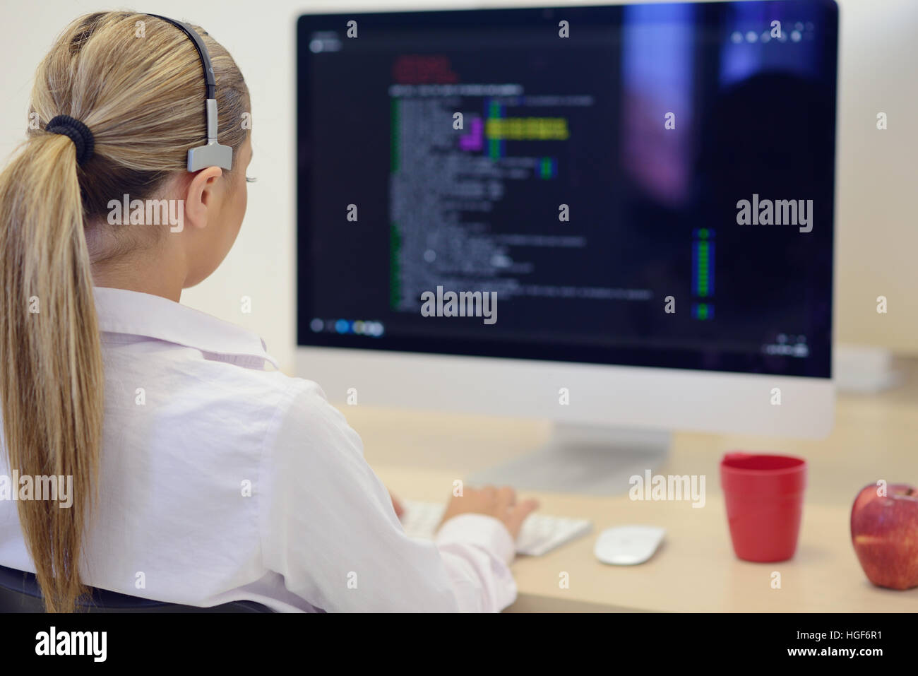 startup business, young woman as software developer working on computer ...