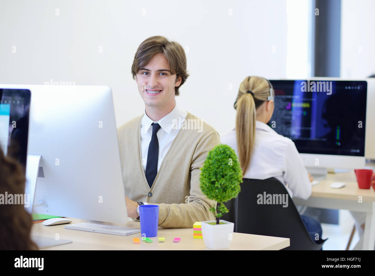 startup business, software developer working on computer at modern ...