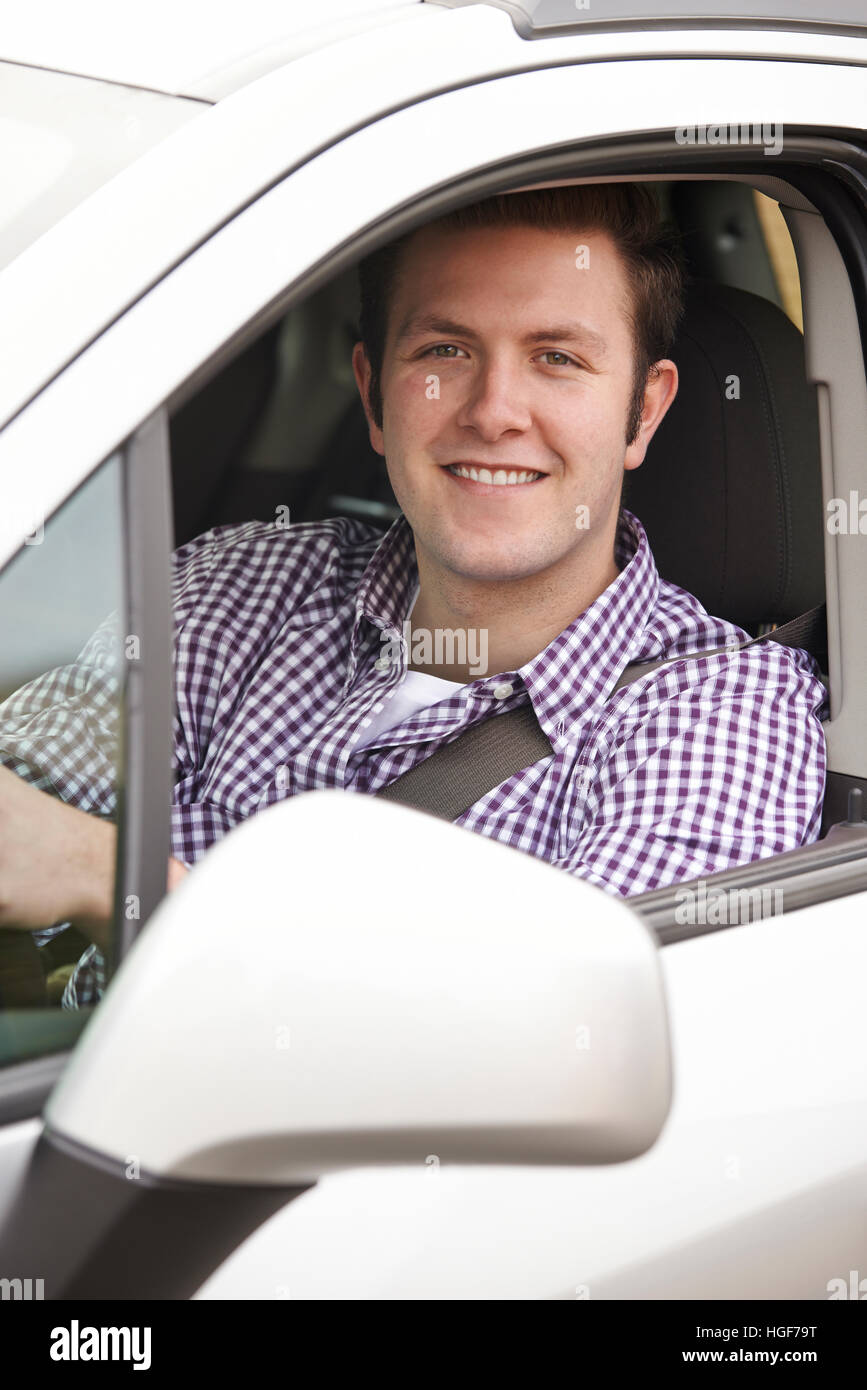 Male looking out of car window hi-res stock photography and images - Alamy