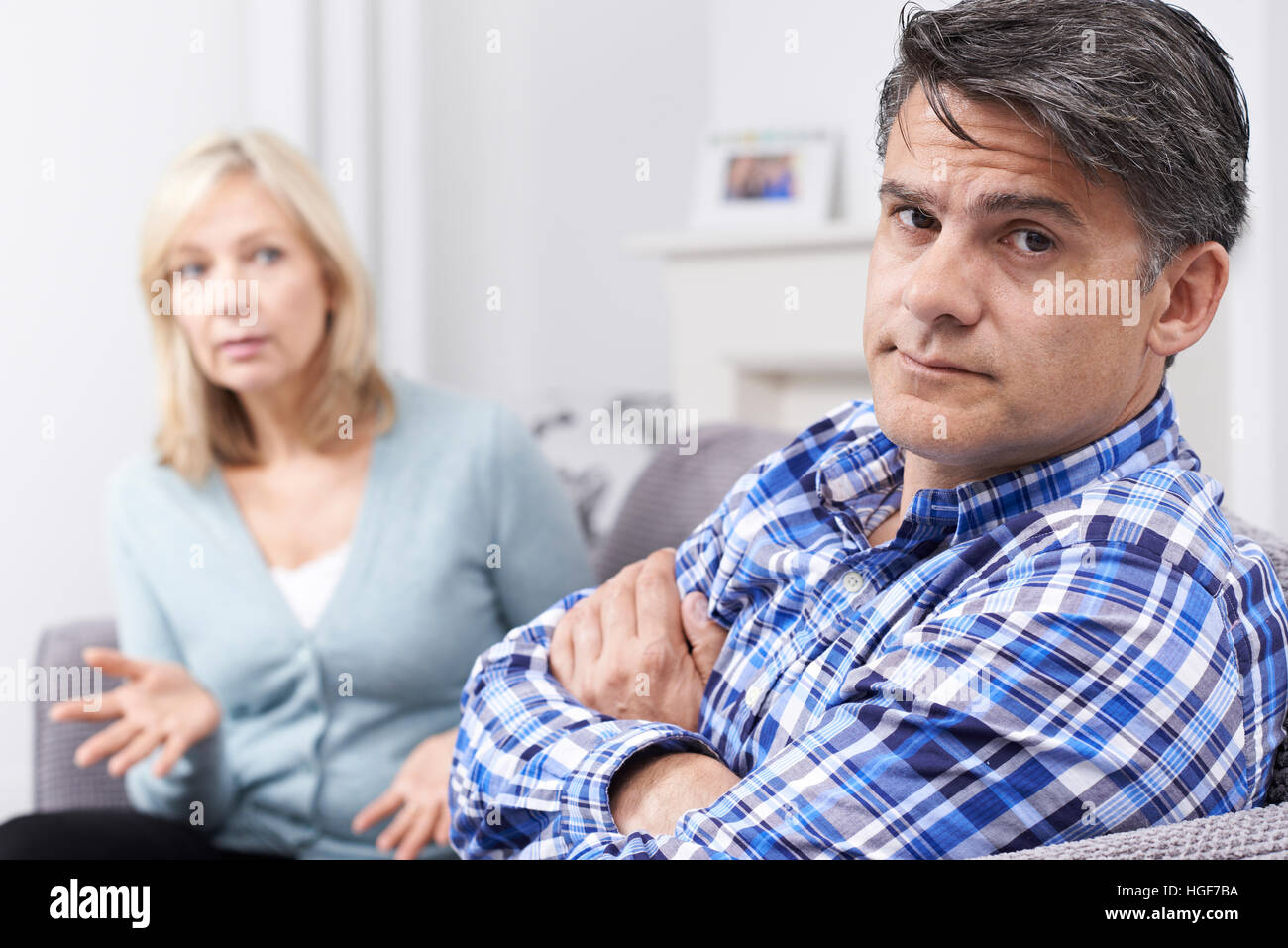 Mature Couple Having Argument At Home Stock Photo - Alamy
