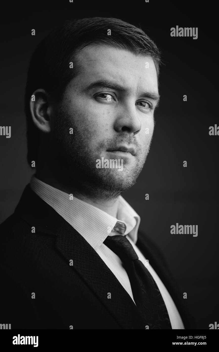 successful businessman on a dark background Stock Photo - Alamy successful businessman on a dark background Stock Photo - Alamy